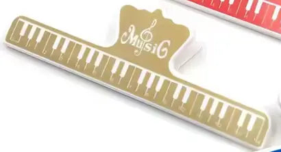 Paper Clip Large Gold with a Keyboard — The Sydney String Centre